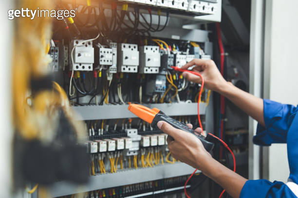 Electrician measurements with multimeter testing current electric in ...