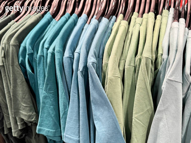 Full frame image of clothing department store display of men's T ...