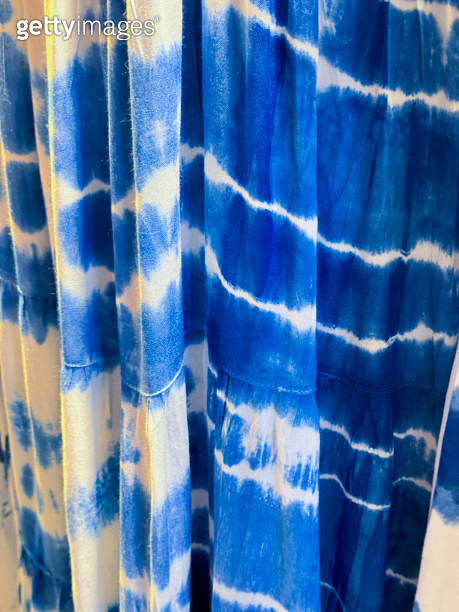 Full frame image of customised, blue and white tie dyed denim sundress ...