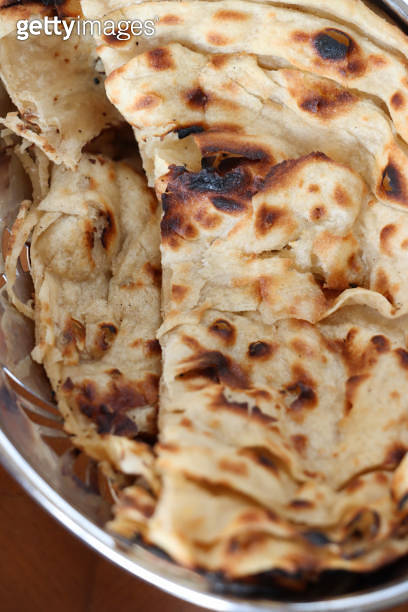 Image of indian food lachha paratha layered bread / traditional indian ...