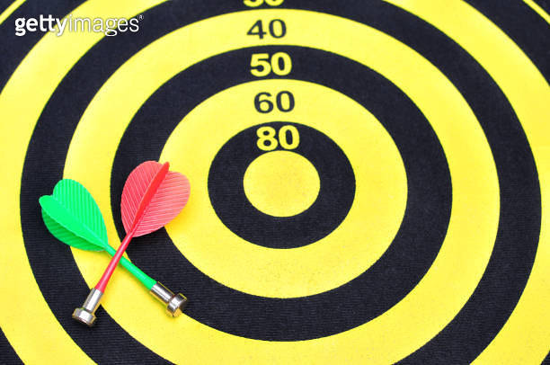 The magnetic needle darts in the center of the target.Concept of ...