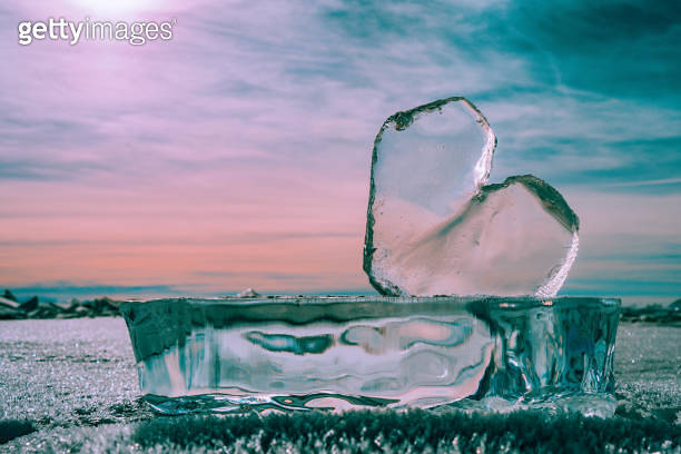 Arctic landscape with a transparent icy heart, frozen snow of Lake ...