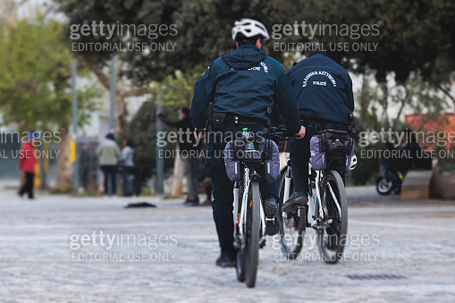 Hellenic Police on bikes with Greek Police logo on uniform, Greek ...