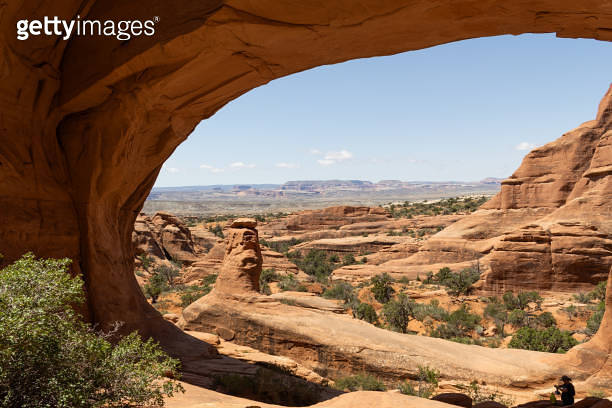 Looking through Tower Arch into the surreal alien landscape in Arches ...