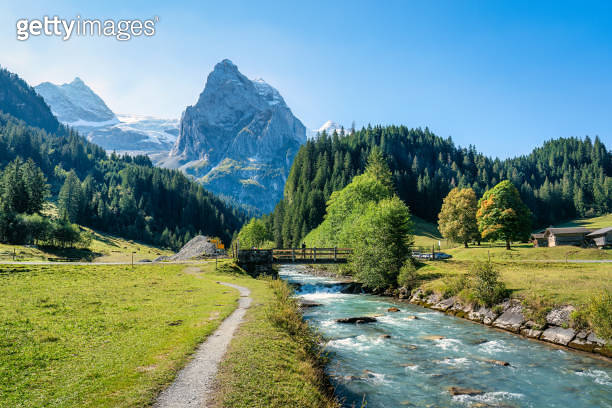 Rosenlaui with wellhorn swiss alps and Reichenbach river in summer at ...