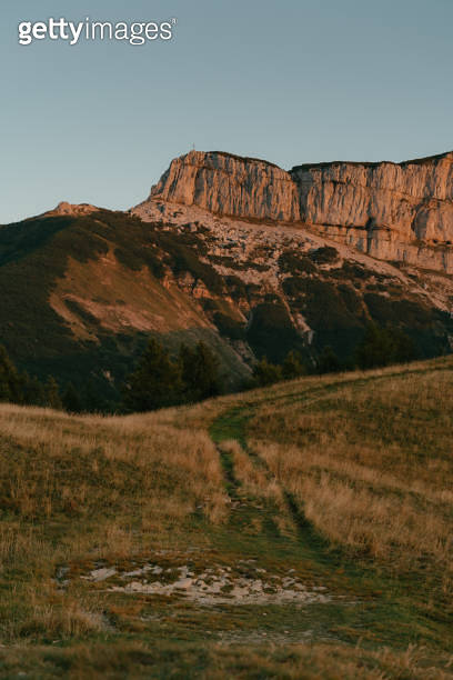 Peaceful scenery of green cliffs and mountains under blue sky. Perfect ...
