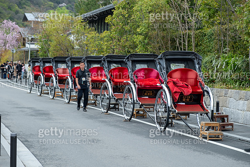 Kyoto Japan. Traditional red hand pulled rickshaw parked on Uji Bridge ...