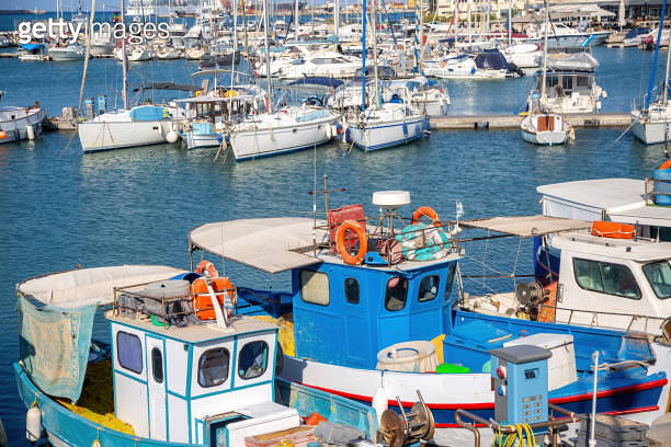 Crete island, destination Greece. Moored vessel with mast and fishing ...