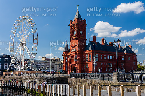 The pierhead building and giant wheel at the waterfront in Cardiff Bay ...