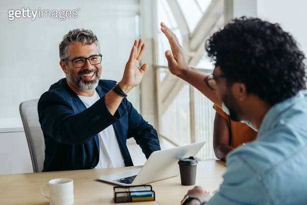 Successful business collaboration between two professional male ...