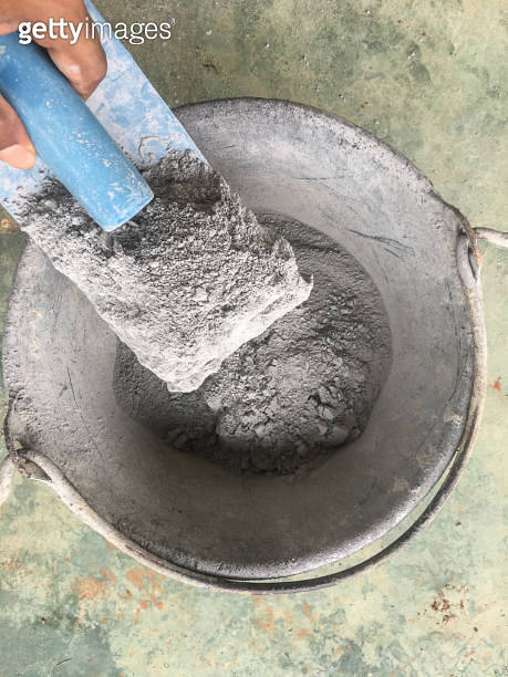 Cement powder, Construction concept, The mixing of stone, Cement, Sand ...