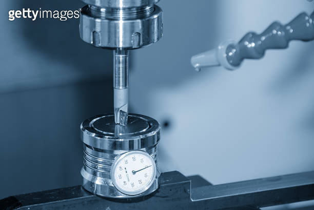 The tool length measurement operation with dial gauge for CNC milling ...