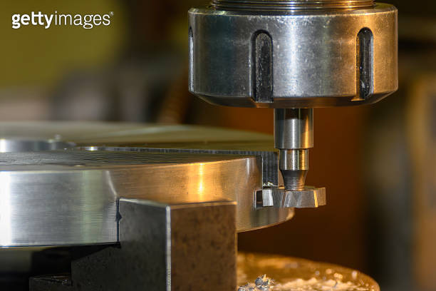 The T-slot cutting process on NC milling machine with T-slot cutter in ...