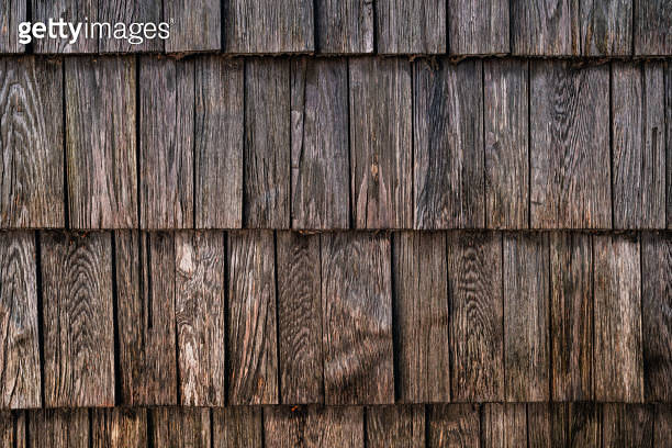Texture of worn wooden roof tile pattern, detail of a typical old ...