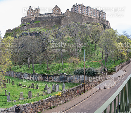 Edinburgh Castle with St Cuthbert's Church graveyard in the foreground ...