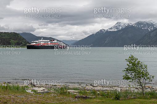 Hurtigruten Expedition Ship Roald Amanudsen moored in the Chilkat inlet ...