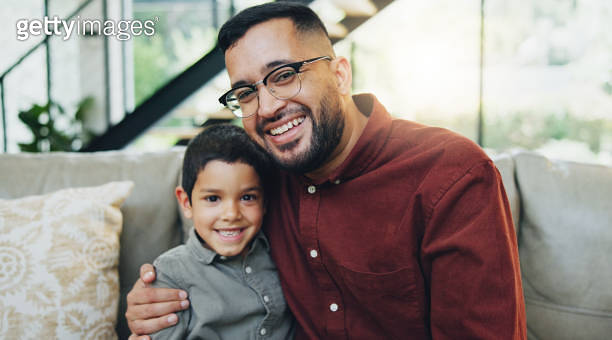 Smile, hug and portrait of child with dad on sofa relaxing together for ...