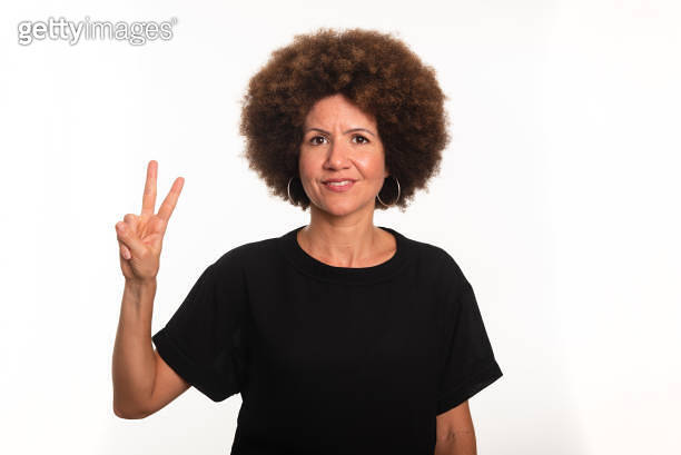 Female interpreter of the Brazilian sign language, Libras, making the ...