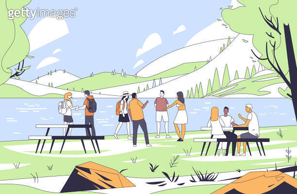 People enjoying outdoor activities by the lake in a scenic landscape ...