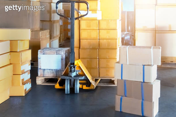 Package Boxes Stack in Warehouse. Cartons, Cardboard Boxes. Storage ...
