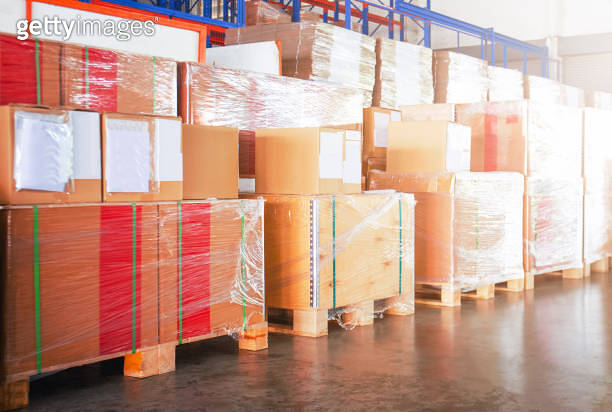 Bulk Pallets of Package Boxes in Storage Warehouse. Wooden Crates ...