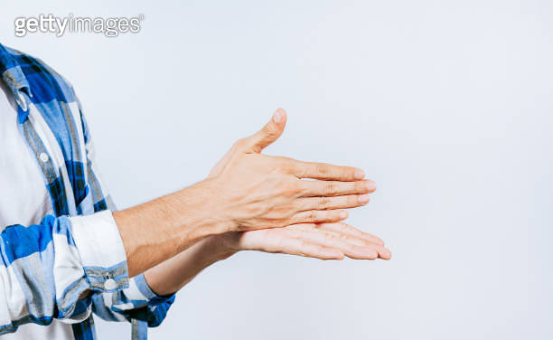 Hands gesturing STOP in sign language. Close up of hands gesturing STOP ...