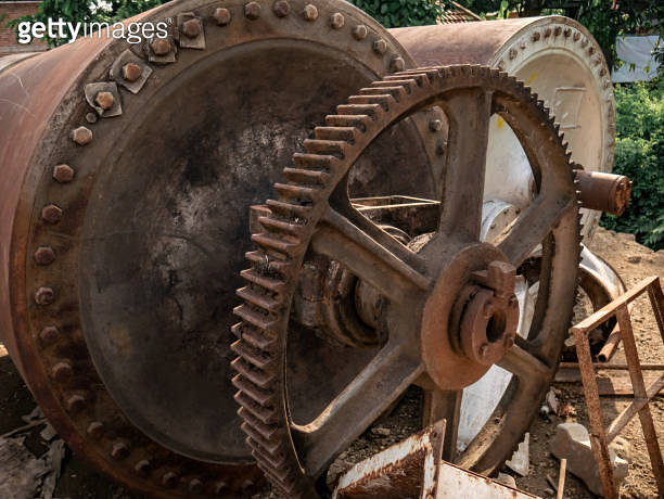 a large, old, rusty gear mounted on a worn out machine 이미지 (2154093340 ...