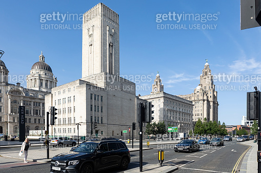 iconic Liverpool buildings and busy traffic on the strand, Liverpool ...