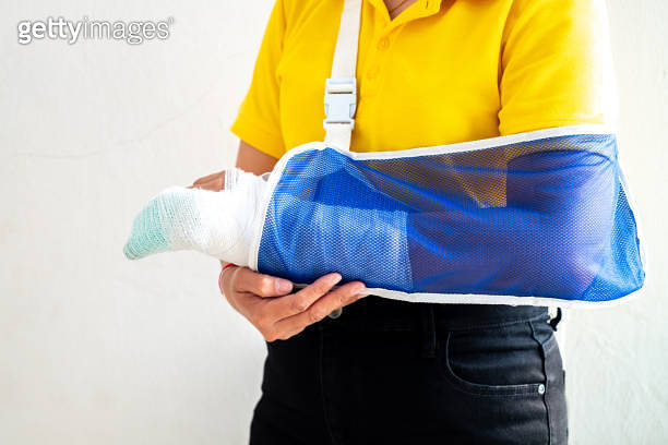 Woman's hand wrapped in white bandage from accident, injury, accident ...