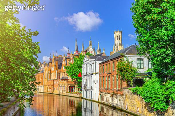 Bruges cityscape, Groenerei Green Canal water of Reie river with ...
