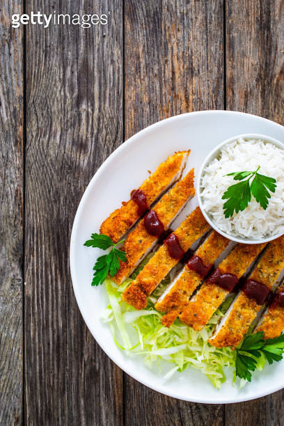 Torikatsu - crispy Japanese chicken cutlet with white rice and cucumber ...