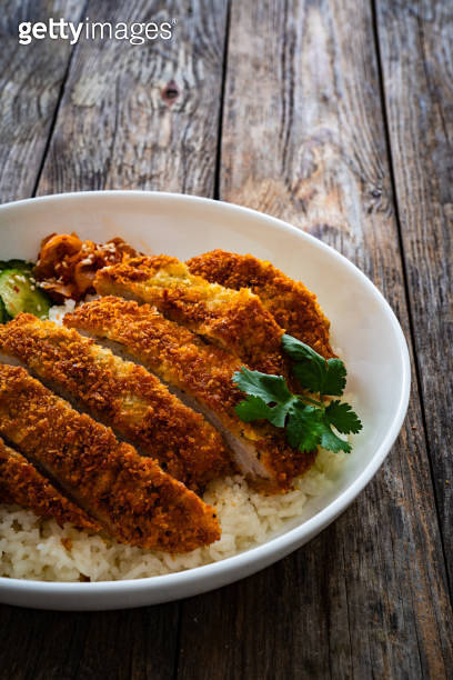 Torikatsu - crispy Japanese chicken cutlet with white rice and cucumber ...