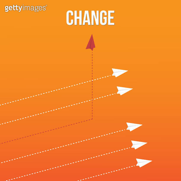 Think differently concept. Red airplane changing direction. New idea ...