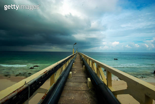 Desalination plant jetty passing through waters of Kavaratti island ...