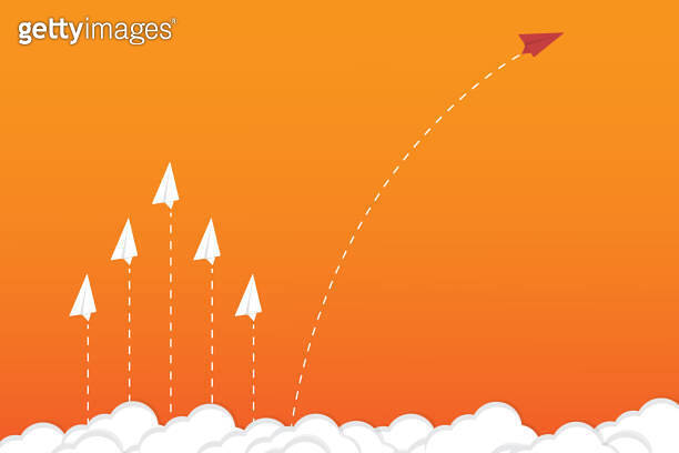 Think differently concept. Red airplane changing direction. New idea ...