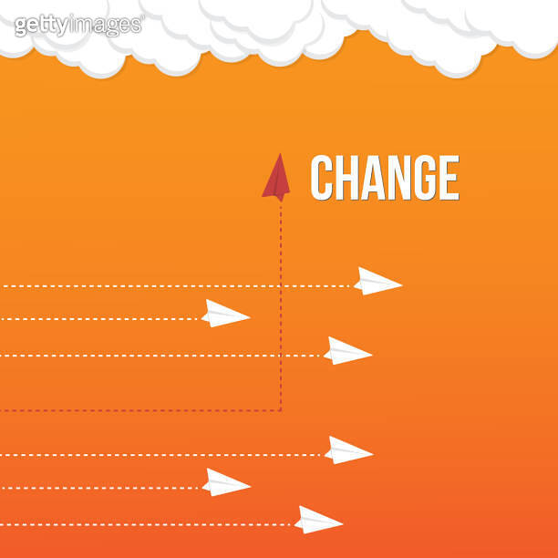 Think differently concept. Red airplane changing direction. New idea ...