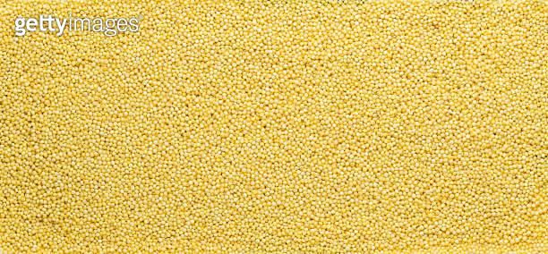 Millets seeds background. Dry millet pattern. Hulled millet, sorghum ...