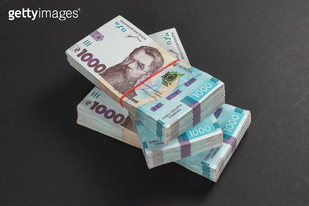 Stack of ukrainian money hryvnia. grivna, hryvna with 1000 banknotes ...