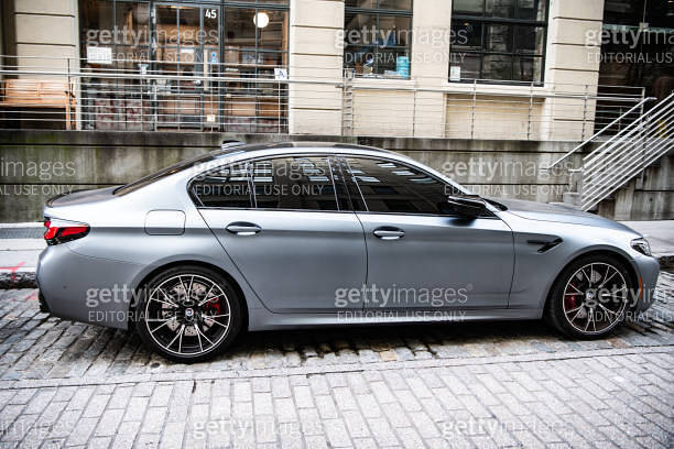 BMW F90 M5 grey color car parked, side view (2191625725) - 게티이미지뱅크