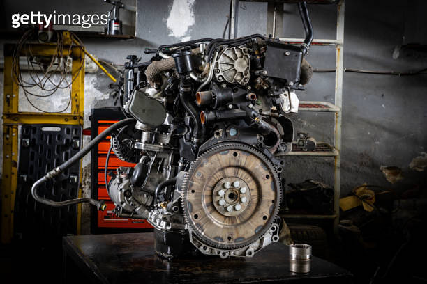 Used car engine placed on workbench in mechanical workshop (2192388622 ...