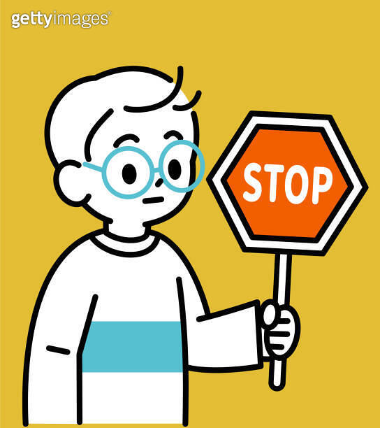 A cute boy with eyeglasses, holding up a Stop sign, three-quarter front ...