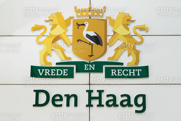 Logo peace and justice at the entrance of the city hall in The Hague ...