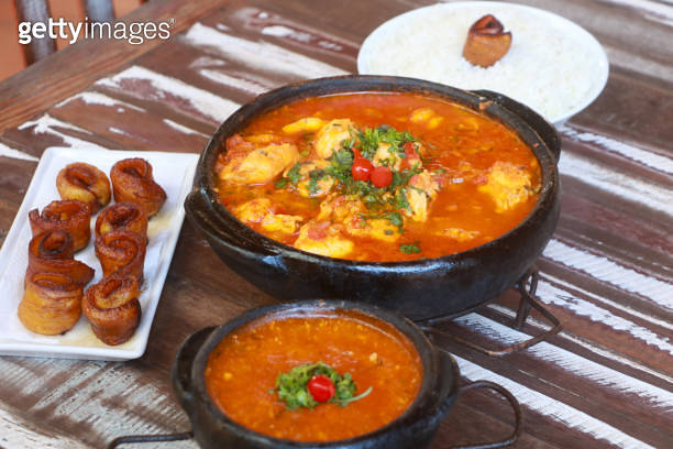The moqueca (fish and shrimp stew) is the center of attention at lunch ...